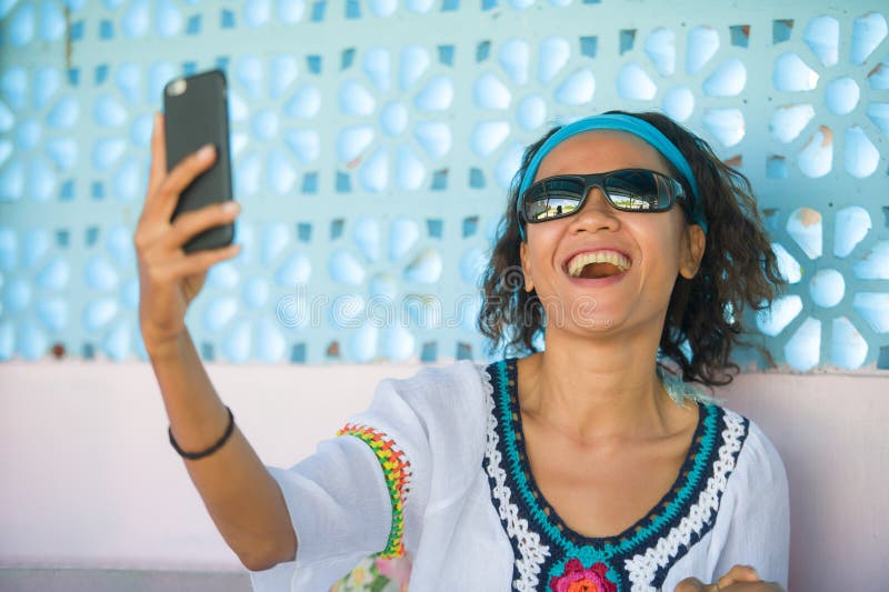 Young Happy And Attractive Southeast Asian Thai Woman Taking Selfie