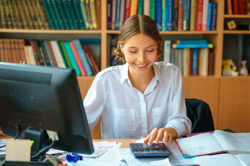 Young Happy Business Lady in White Shirt Sitting at Table with Computer ...
