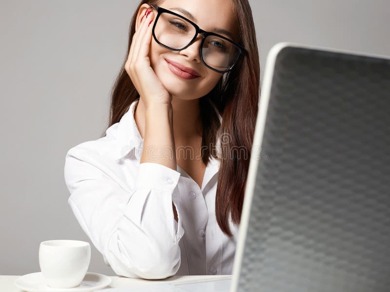 Young Happy Business Woman in Office. Beautiful Student Girl in Glasses ... Young Happy Business Woman in Office. Beautiful Student Girl in Glasses ...