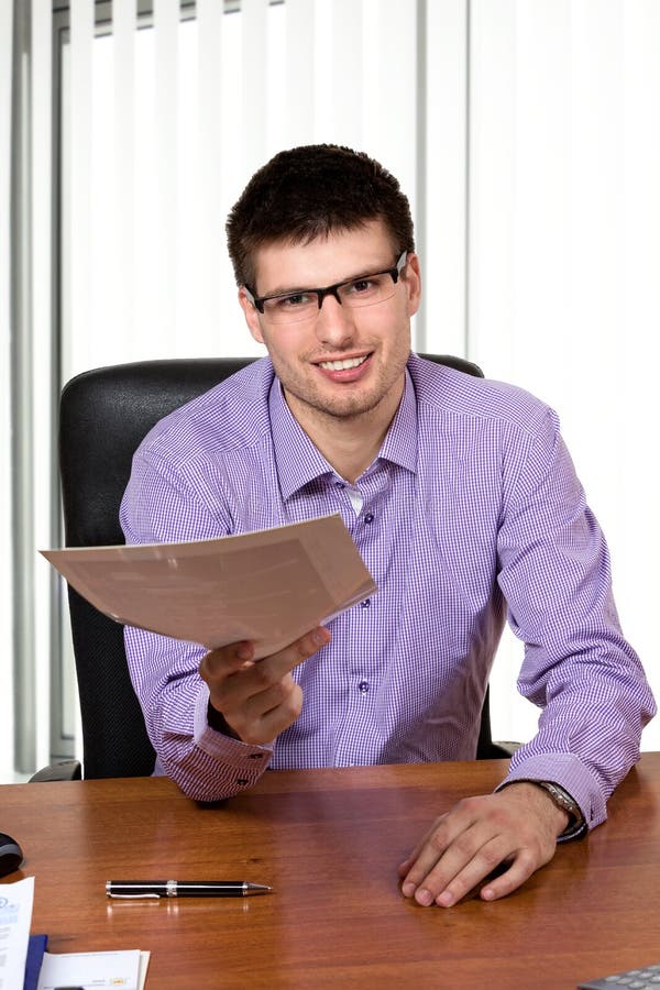 Young Happy Businessman Giving Documen Stock Photo - Image of corporate ...