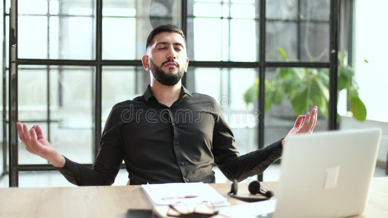 Young Happy Businessman Using Laptop Computer Working at His Desk at ...