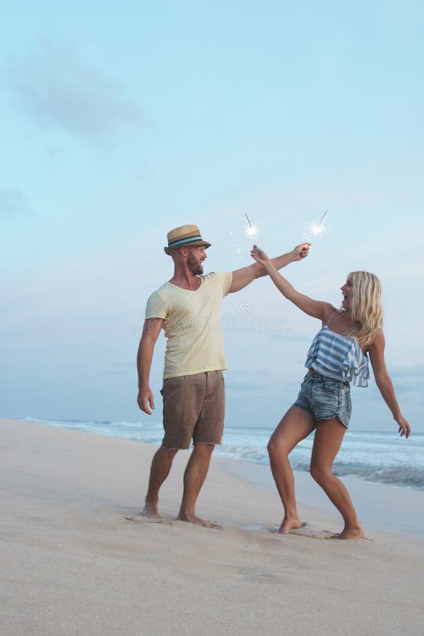 Celebration on the beach stock image. Image of couple - 107860763