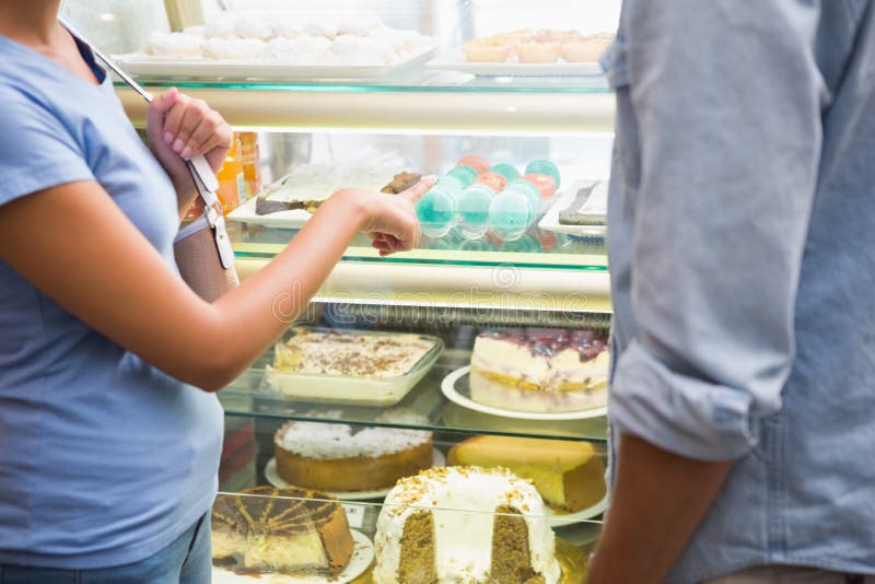 Young Happy Couple Choosing Cake Stock Image - Image of cheerful, city ...