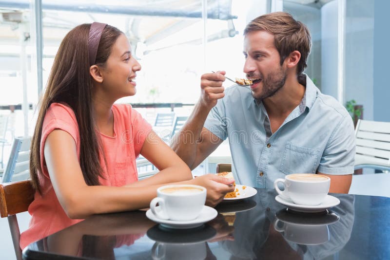 Young Happy Couple Eating Cake Together Stock Image - Image of male ...