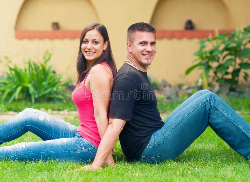 Young Happy Couple Having Fun in the Garden Stock Photo - Image of hair ...