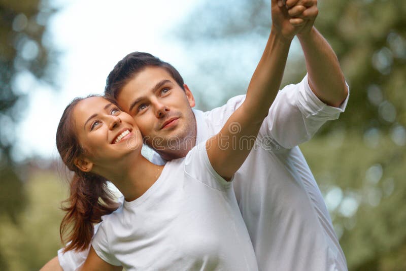 Young Happy Couple Hugging and Laughing. Stock Image - Image of ...
