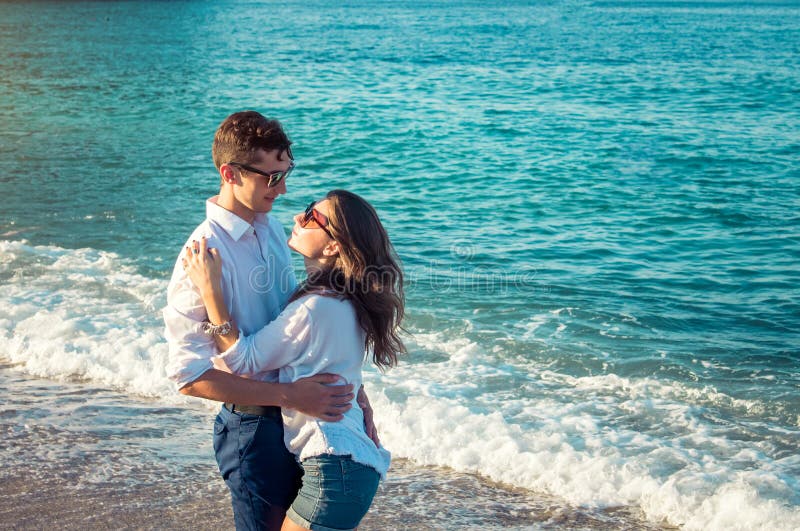 Young Happy Couple Hugging on Tropical Beach Stock Photo - Image of ...