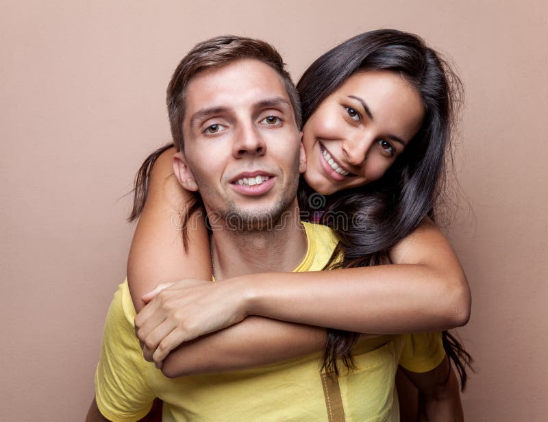 Young happy couple in love stock image. Image of embrace - 58844257