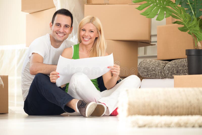 Young Happy Couple Moving into Their New Home Stock Photo - Image of ...