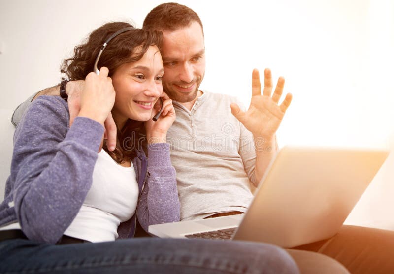 Young Happy Couple Video Calling on Tablet Stock Photo - Image of ...