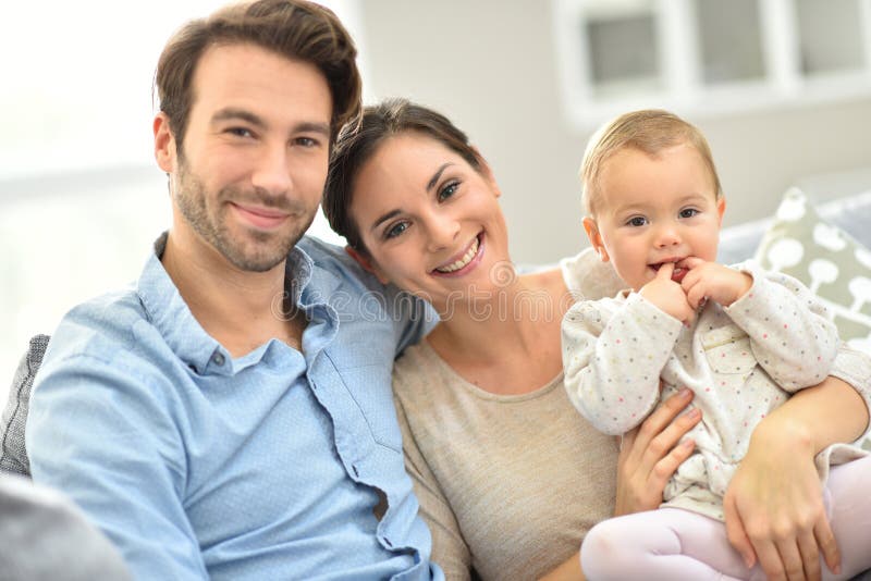 Young Happy Family of Three on Sofa Stock Photo - Image of little ...