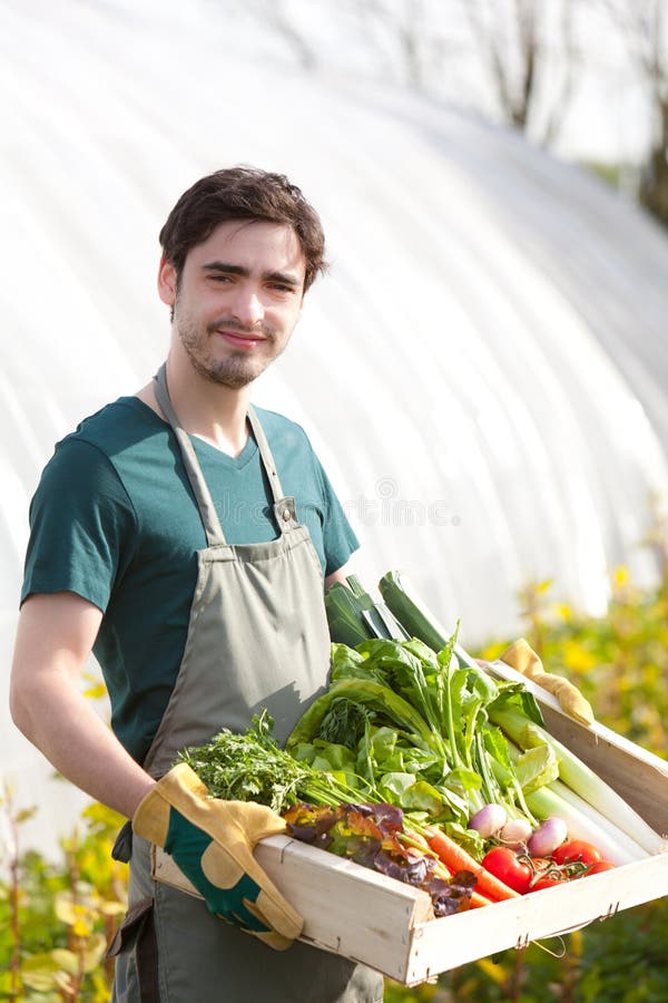Happy Farmer with Laptop Computer in Front of Field Stock Image - Image ...