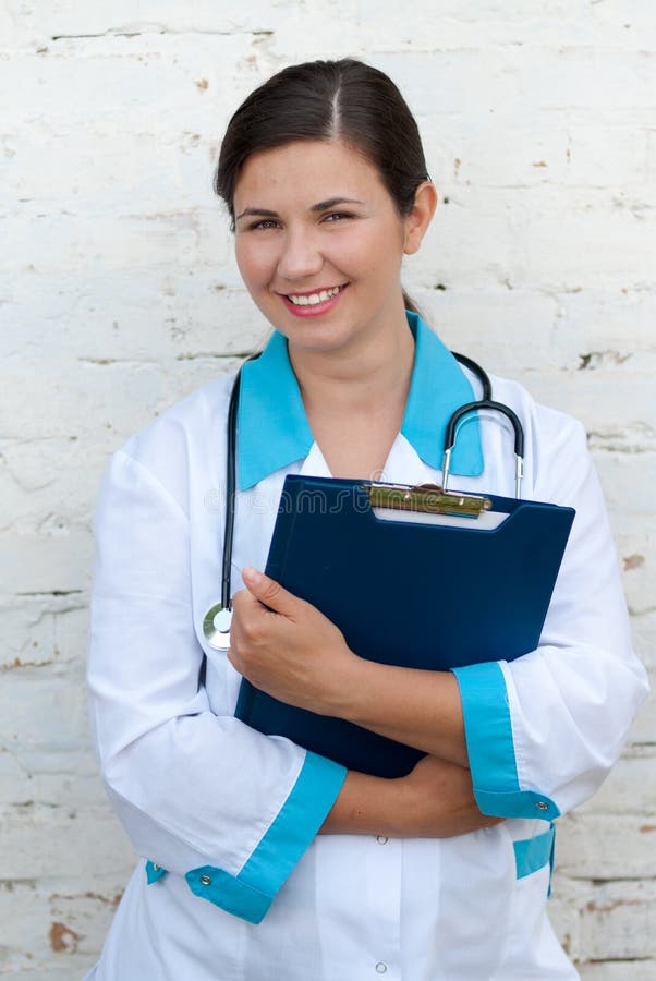 Young happy female medic stock image. Image of clinical - 27410899