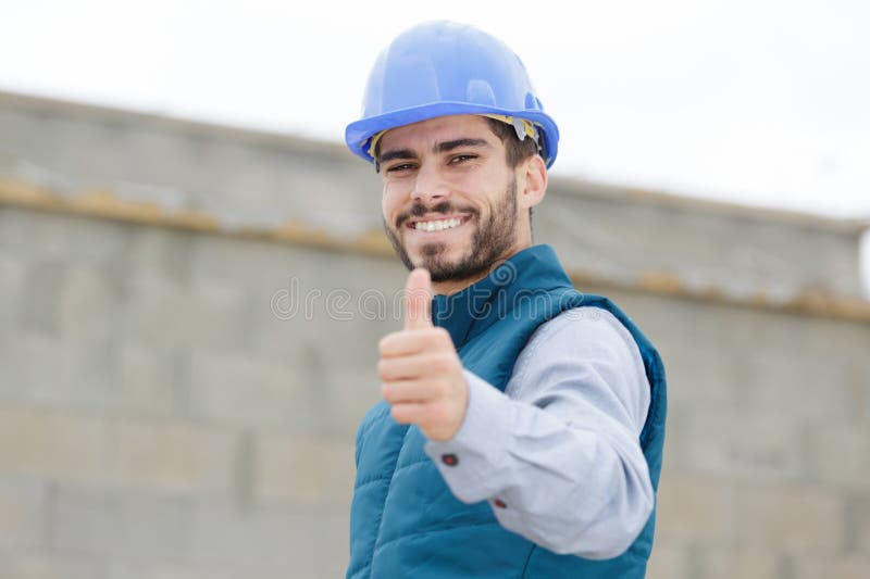 Young Happy Handsome Bearded Male Builder Showing Thumb Up Stock Image ...