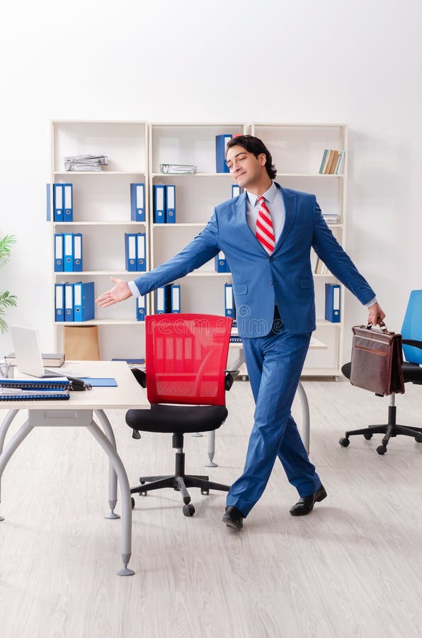 The Young Happy Male Employee in the Office Stock Photo - Image of ...