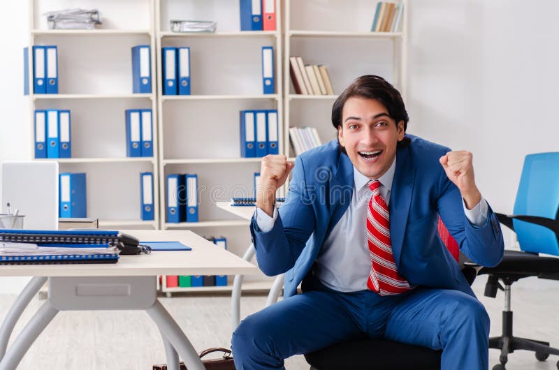 The Young Happy Male Employee In The Office Stock Photo - Image of ...