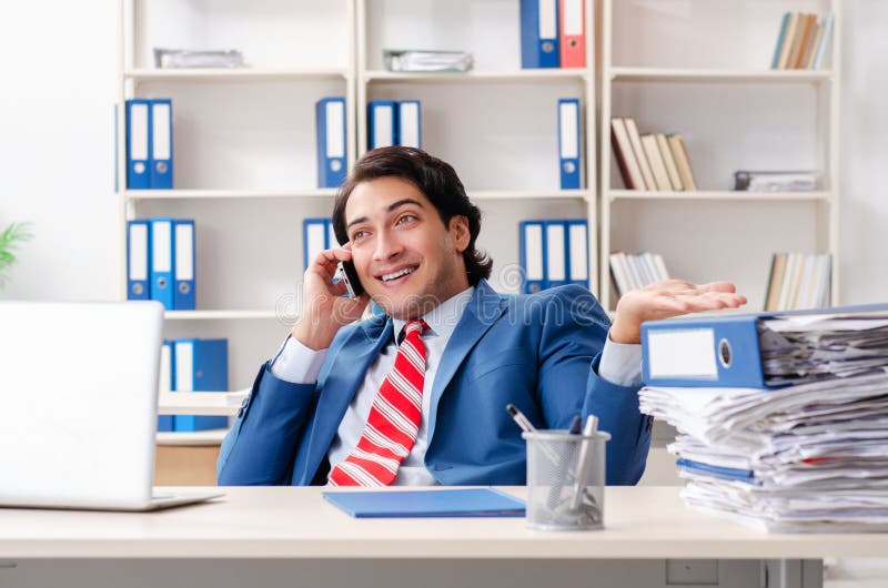 The Young Happy Male Employee in the Office Stock Photo - Image of ...