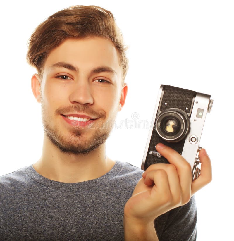 Young Man with Camera. Isolated Over White Background. Stock Photo ...
