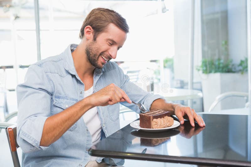 Young Happy Man Eating His Cake Stock Photo - Image of food, cake: 56494532