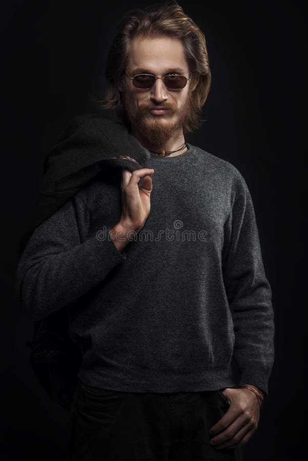 Young Happy Man with a Jacket Slung Over His Shoulder Stock Photo ...