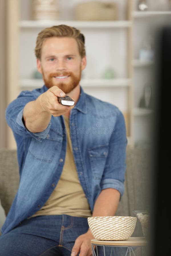 Young Happy Man Watching Tv Stock Photo - Image of cheerful, resting ...