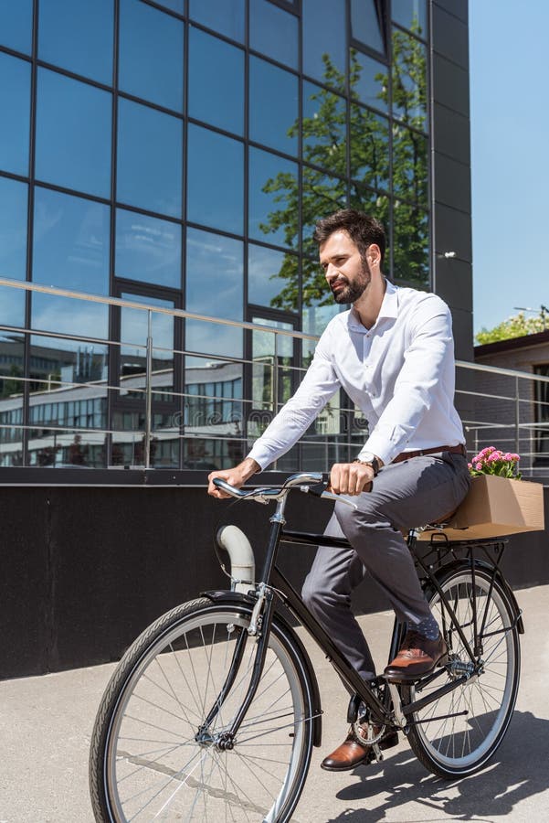 Young Happy Manager Riding on Bicycle with Box Stock Photo - Image of ...