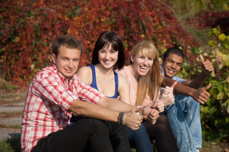 Young happy people outdoor stock image. Image of blue - 51444431