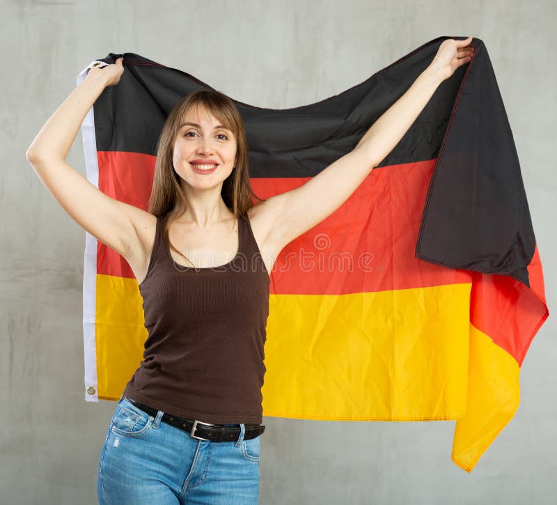 Young Happy Pretty Woman Displaying Flag of Germany Stock Image - Image ...