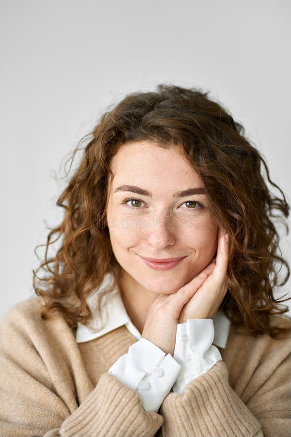 Young Happy Pretty Woman Looking At Camera Isolated At White Vertical