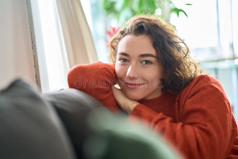 Young Happy Pretty Woman Relaxing Sitting on Couch at Home. Portrait ... Young Happy Pretty Woman Relaxing Sitting on Couch at Home. Portrait ...
