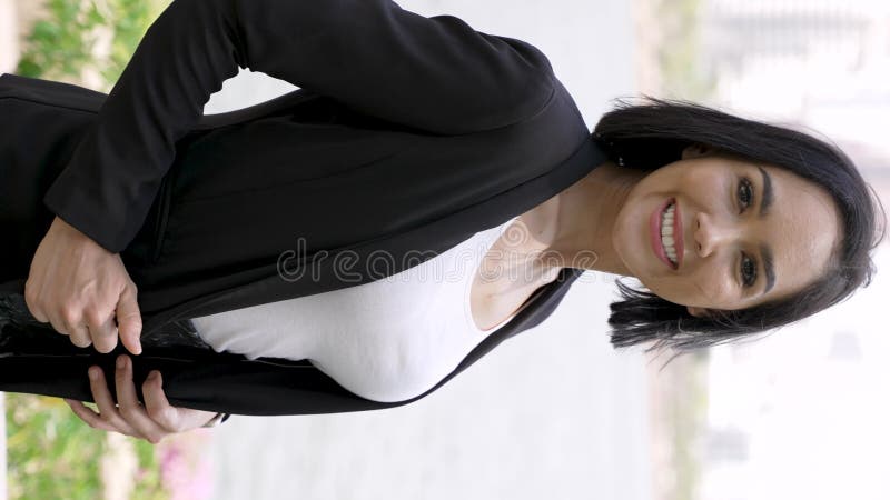 Portrait Happy Smiling Young Mixed Race Business Woman In Black Jacket
