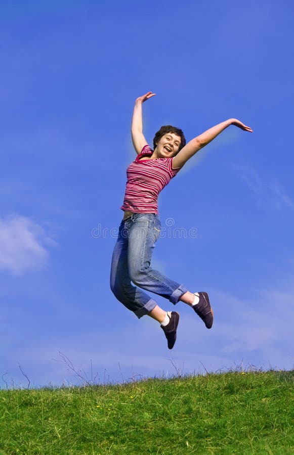 Young Happy Woman Jumping High Stock Image - Image of arms, background ...