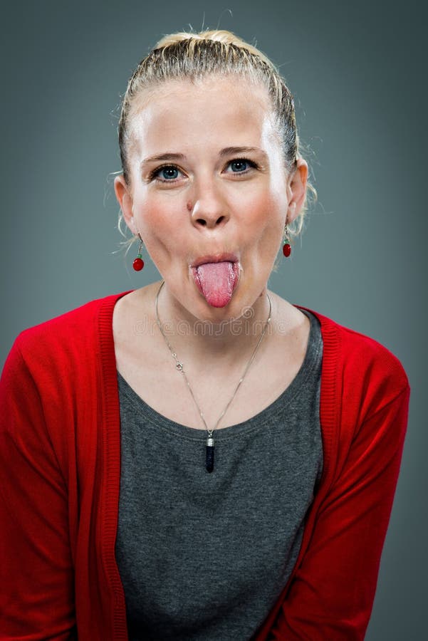 Woman Sticking Her Tongue Out Stock Image - Image of expression, model ... Woman Sticking Her Tongue Out Stock Image - Image of expression, model ...