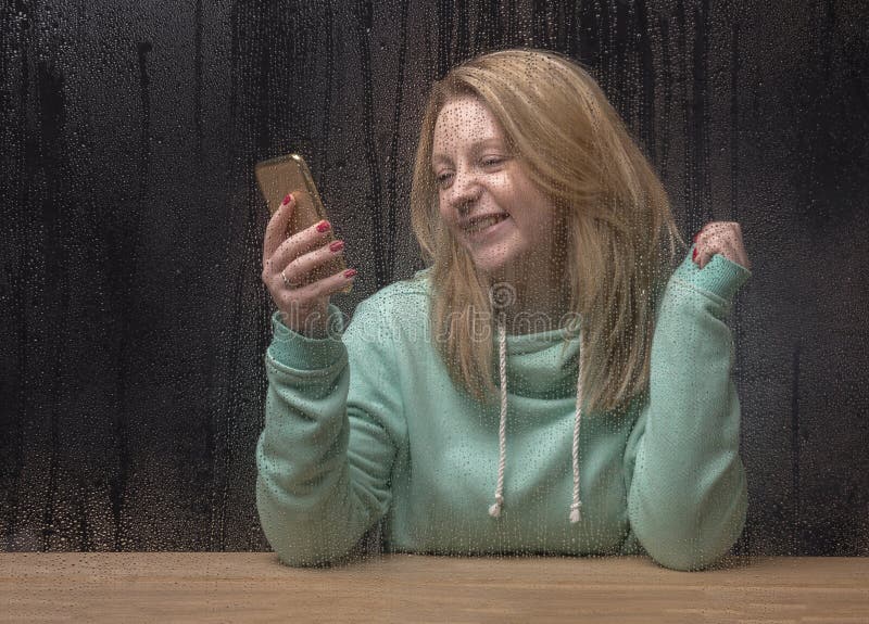 Young Happy Woman Texting on a Mobile Phone. Stock Image - Image of ...