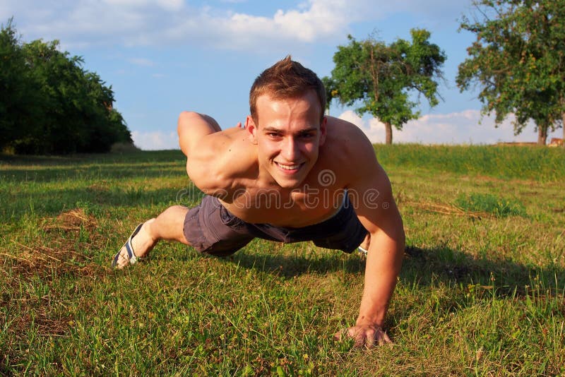 Young Healthy Man Doing One Arm Push Up Stock Photo - Image of sporty ...