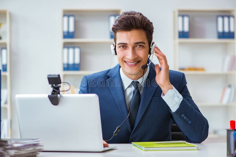 The Young Help Desk Operator Working in Office Stock Image - Image of ...