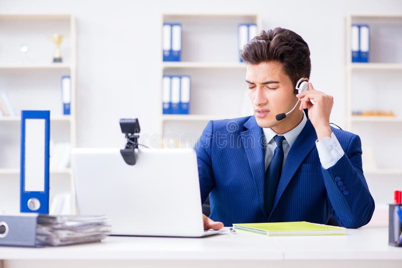 The Young Help Desk Operator Working in Office Stock Image - Image of ...