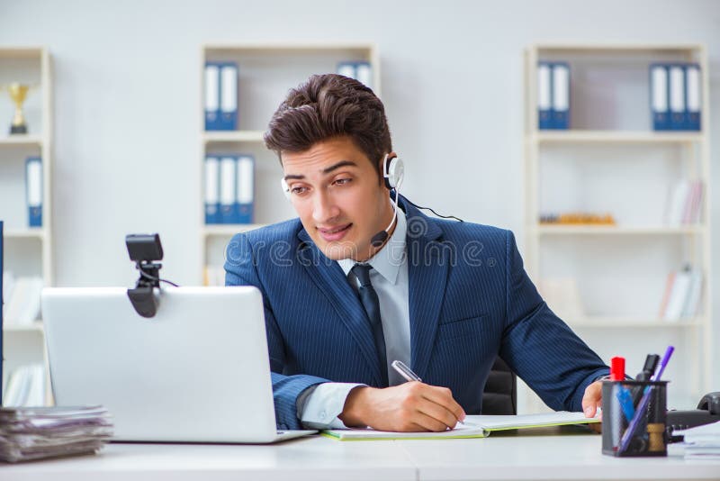 The Young Help Desk Operator Working in Office Stock Photo - Image of ...