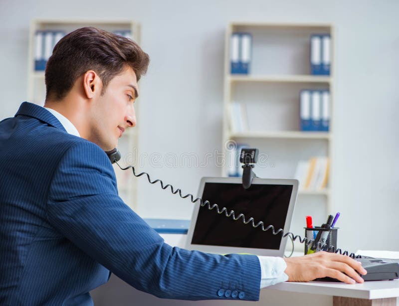 Young Help Desk Operator Working in Office Stock Photo - Image of ...