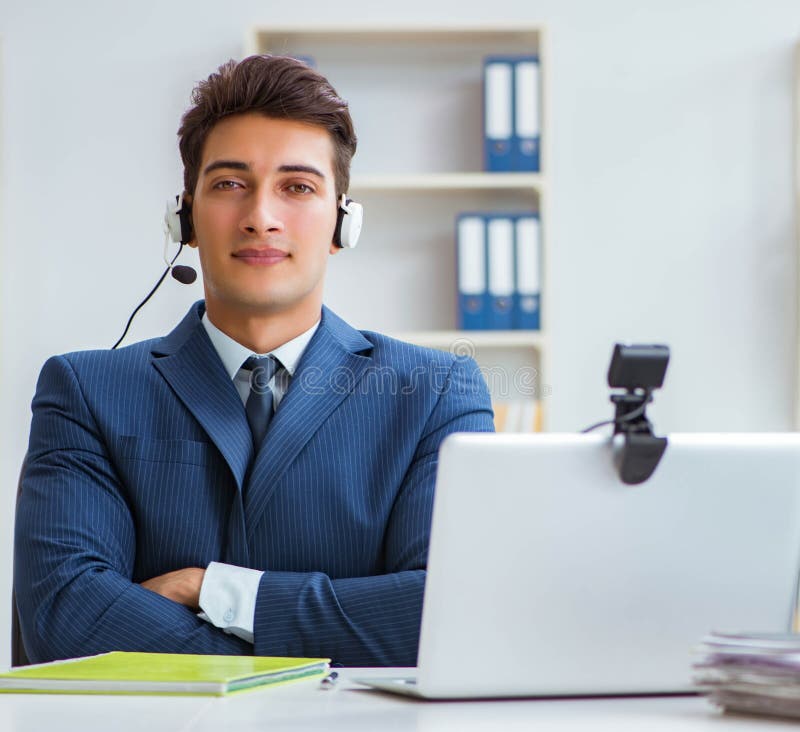 Young Help Desk Operator Working in Office Stock Photo - Image of desk ...