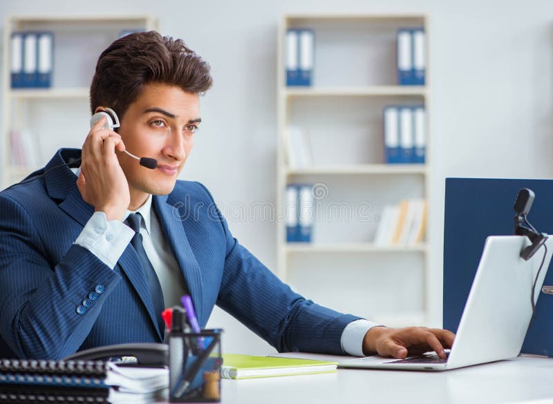 Young Help Desk Operator Working in Office Stock Image - Image of ...