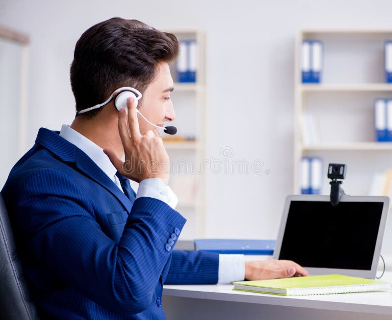 Young Help Desk Operator Working in Office Stock Image - Image of desk ...