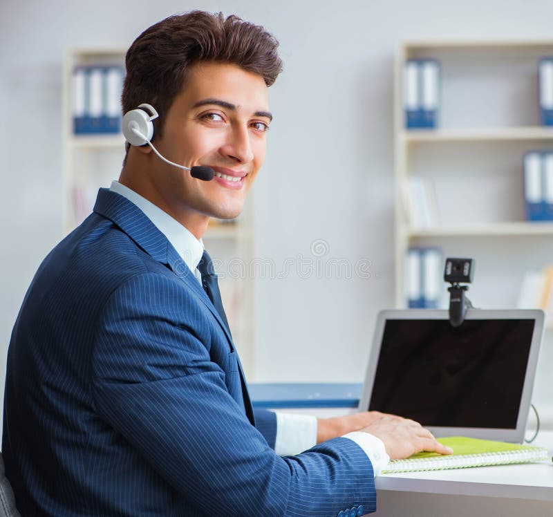 Young Help Desk Operator Working in Office Stock Photo - Image of ...