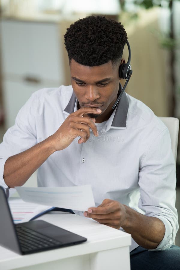 Young Help Desk Operator Working in Office Stock Photo - Image of ...