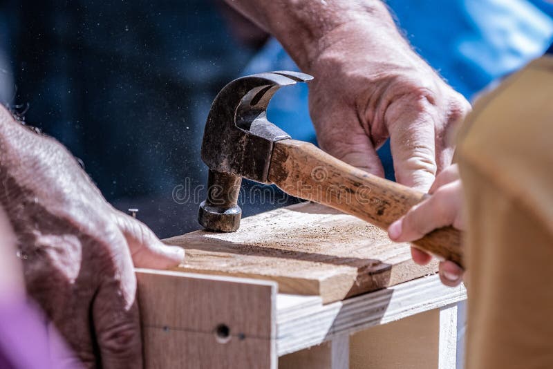 Young helper with a hammer stock photo. Image of holding - 126269124