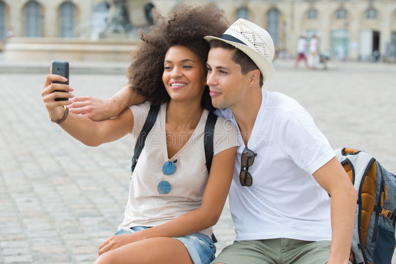 Young Hipster Couple Taking Selfie while on City Break Stock Image ...