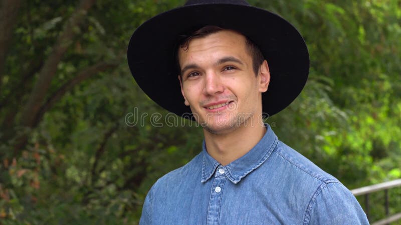 Young Hipster Man in Hat Laughing, Relaxed in Front of the Camera Stock ...
