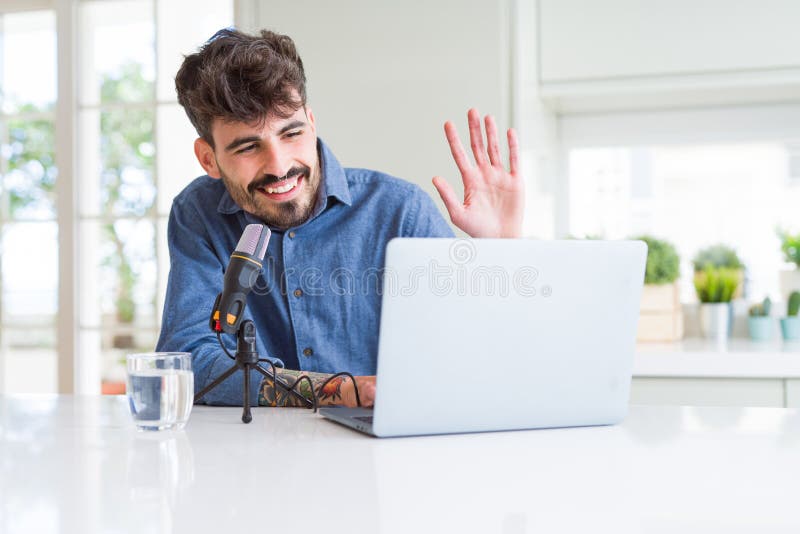 Young Hipster Man Recording Podcast Using Laptop, Broadcasting an ...