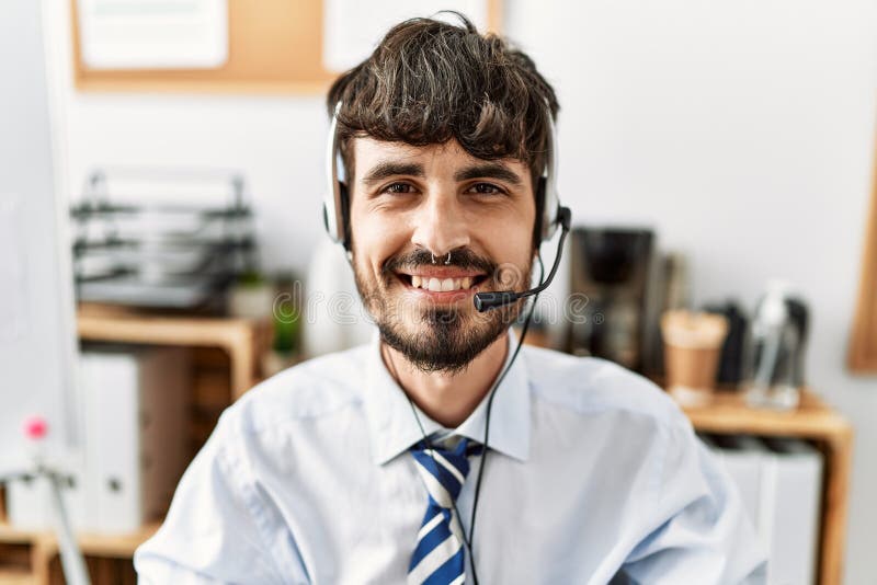 Young Hispanic Call Center Agent Man Smiling Happy Working at the ...