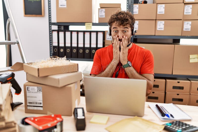 Young Hispanic Call Center Agent Man Working at Warehouse Afraid and ...